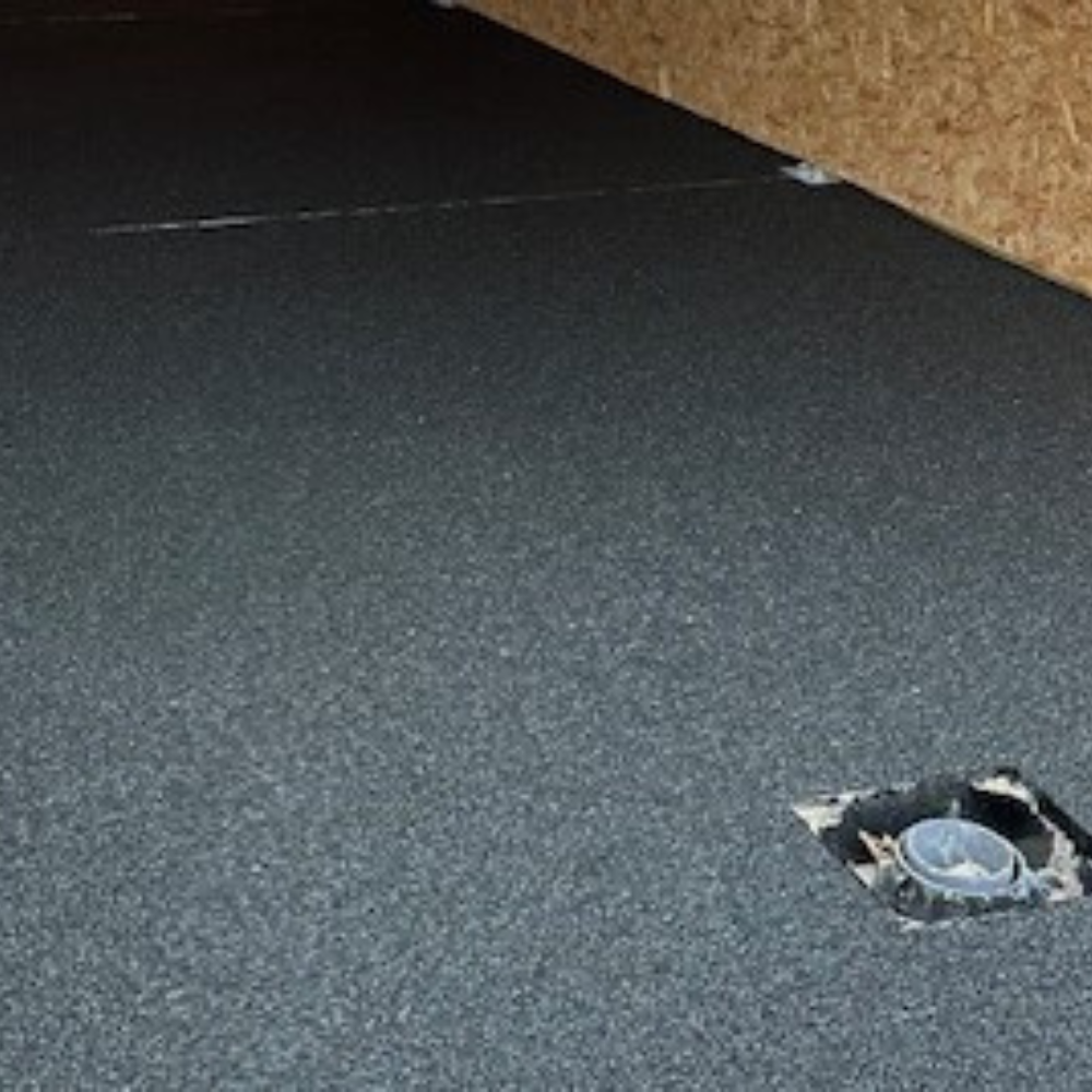 Renovating a Garage Floor with Resin Bound Stone - Azzotech Ltd